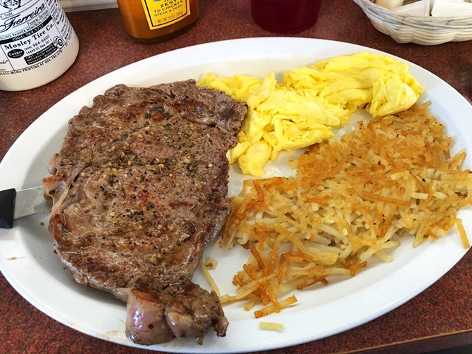 The breakfast steak and eggs plate&mdash;where a perfectly seasoned slab of beef meets fluffy scrambled eggs and hash browns crispy enough to make you weep.