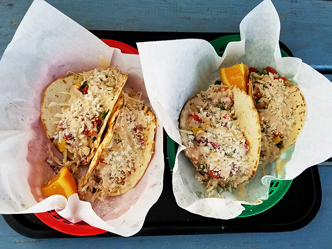 These tacos look like they were assembled by someone who genuinely wants you to be happy. The orange wedges aren't just garnish&mdash;they're sunshine in fruit form.
