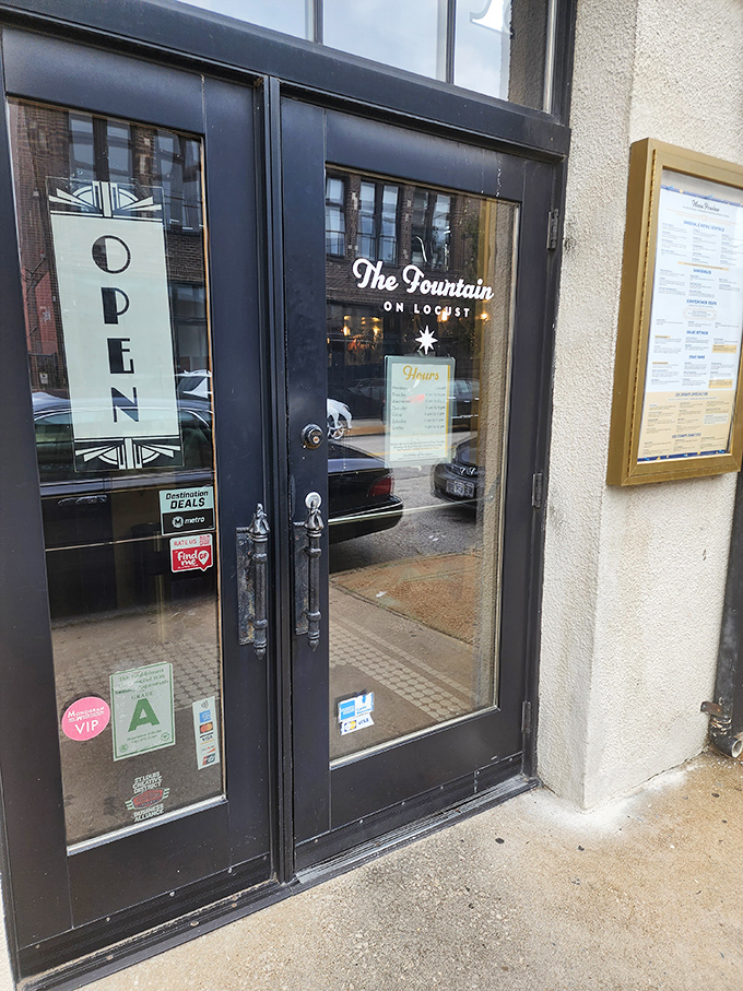 The entrance whispers promises of Art Deco elegance and ice cream indulgence, like a portal to a more civilized era of dining.