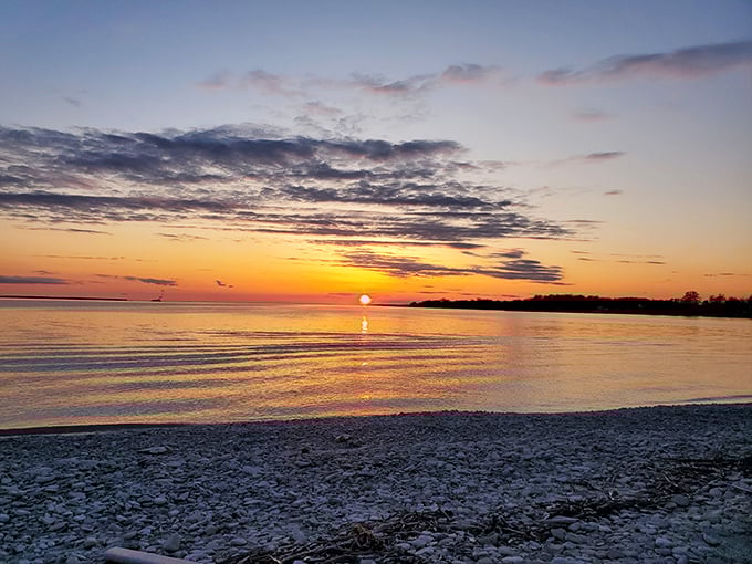 "And God said, 'Let there be light.'" Sunset on Kelleys Island makes believers of us all. The pebble shore provides front-row seating.