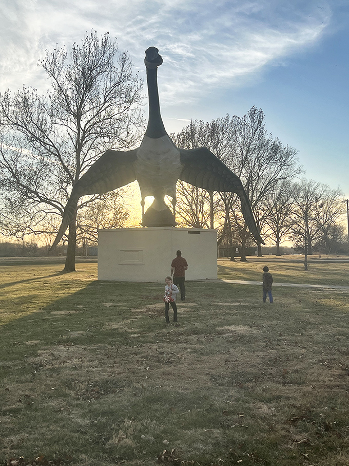 Families gather beneath Maxie's wings as daylight fades. Creating multi-generational memories is what quirky roadside attractions do best.