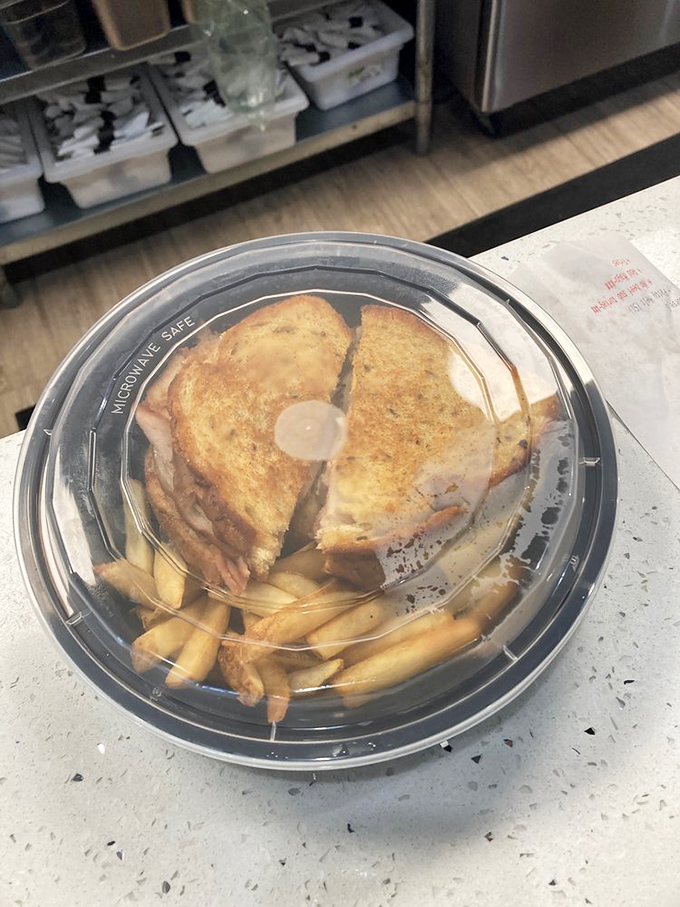 To-go packaging that promises the sandwich inside won't lose its dignity during transit. Those fries are coming along for the ride too!