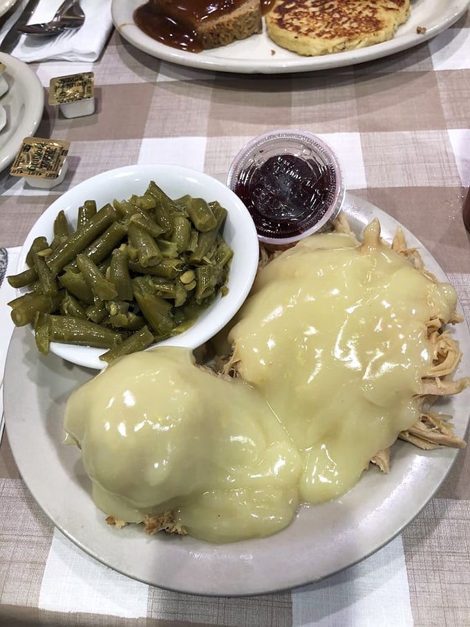 Turkey dinner with green beans and cranberry sauce—Thanksgiving without the family drama, available whenever you need comfort food therapy.