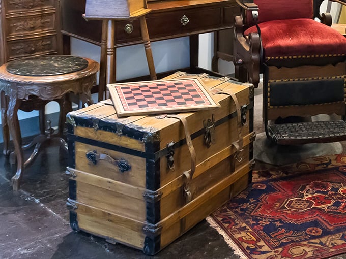 That vintage steamer trunk has probably crossed more oceans than most people's passports. Now it wants to be your coffee table.