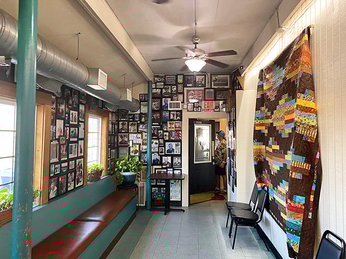 The waiting area's photo-covered walls tell the story of West Side Cafe better than any website could—this is a place that's part of the community fabric.
