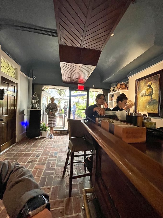 Brick floors and wooden counters create a pathway to deliciousness. The entryway feels like stepping through a portal to Old Charleston.