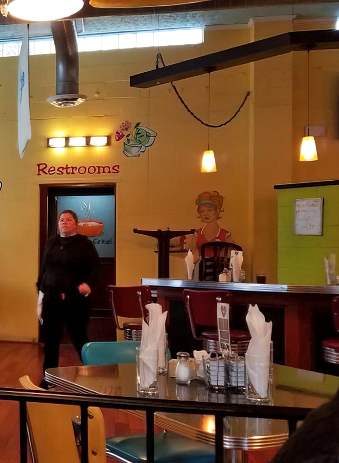 Even the path to the restrooms continues the color story&mdash;proof that at Good Morning Mama's, no detail is too small.