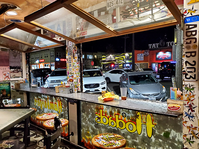 The window seats offer prime people-watching with your meal—though the burger will likely command most of your attention.