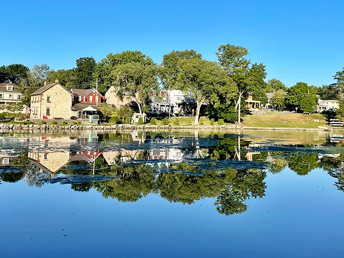 Boiling Springs offers mirror-like reflections on its peaceful lake, doubling the beauty of the historic homes along its shore.