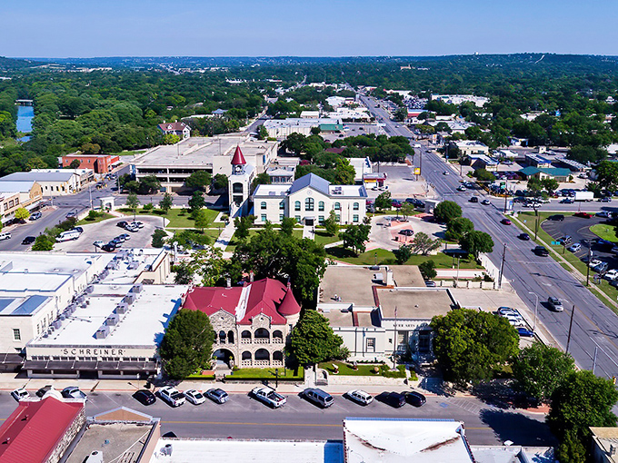From above, Kerrville reveals its perfect nestling in the Hill Country landscape, with the Guadalupe River winding through like a blue ribbon.