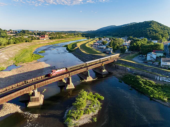 The little engine that could&mdash;and definitely does. This aerial view captures the train crossing the river like a scene from a model railroad enthusiast's dream come true.