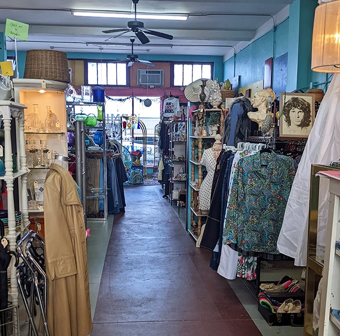The treasure-hunter's perspective: an aisle that beckons you deeper into decades past, where each rack holds the potential for vintage glory.