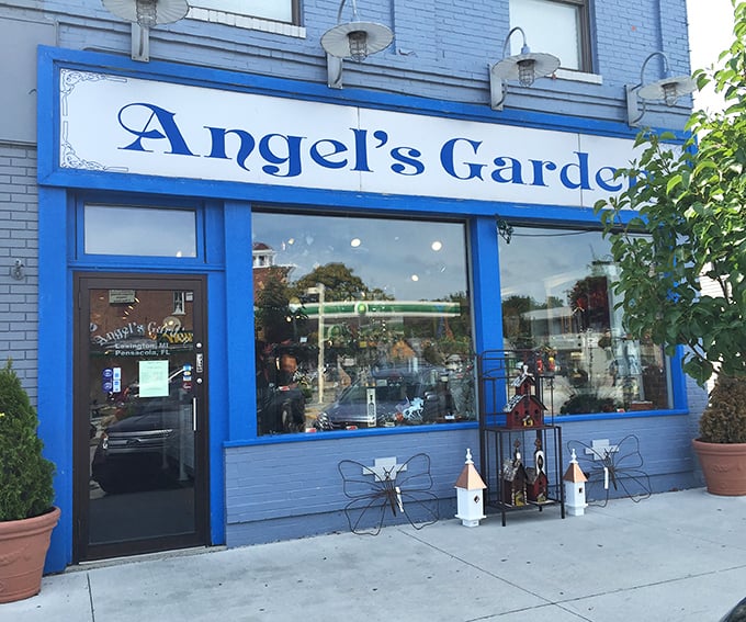 Angel's Garden's vibrant blue storefront adds a pop of color to Main Street, with whimsical garden decorations hinting at treasures within.