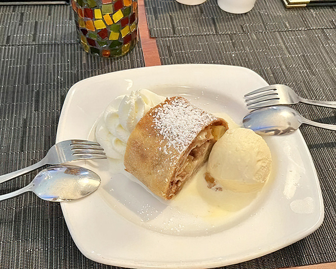 Apple strudel with vanilla ice cream: where fruit technically counts as nutrition but tastes like everything your diet warned you against.