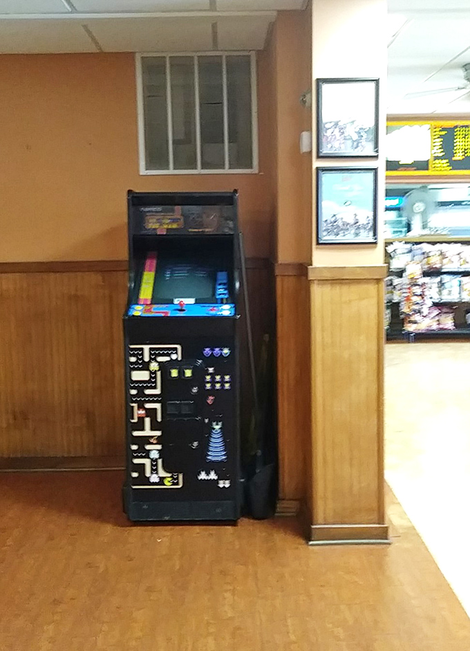 Even the vintage arcade game knows it's playing second fiddle to the real entertainment&mdash;those magnificent cheesesteaks just feet away.