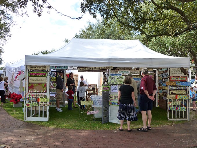 Art festival tents pop up like colorful mushrooms, proving culture thrives even where the dress code includes swimsuits.