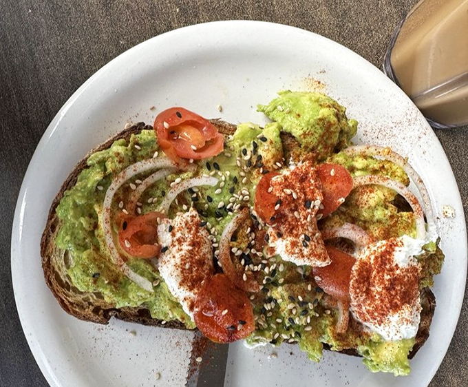 Avocado toast that refuses to be basic&mdash;dressed up with tomatoes, onions, and spices like it's heading to the breakfast red carpet.