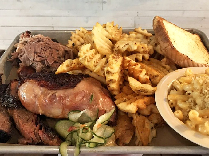The BBQ sampler that answers life's most important question: "Why choose one meat when you can have them all?" Mac and cheese included for good measure.