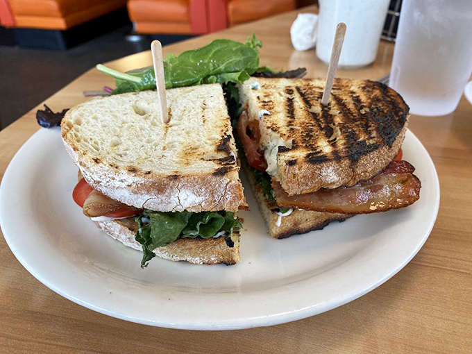 This isn't just a BLT&mdash;it's architecture between bread. The perfect ratio of bacon, lettuce and tomato, held together with wooden stakes like a breakfast vampire slayer.