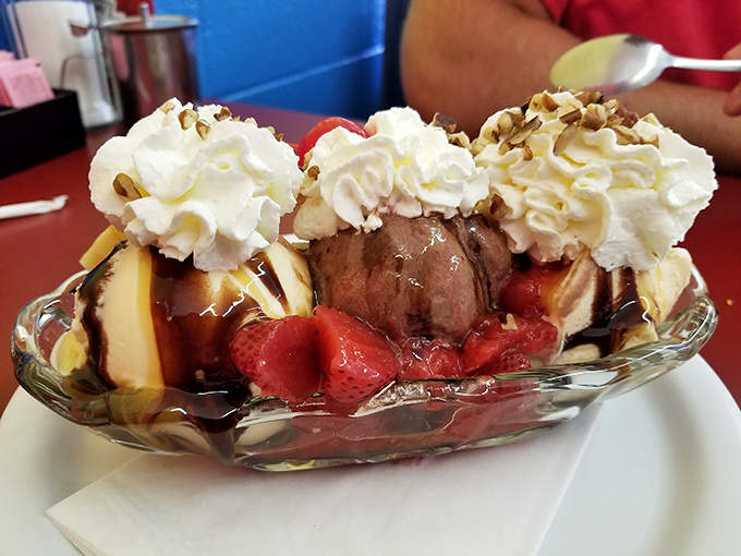 Three scoops of joy topped with whipped cream and a cherry create the perfect ending to any meal.