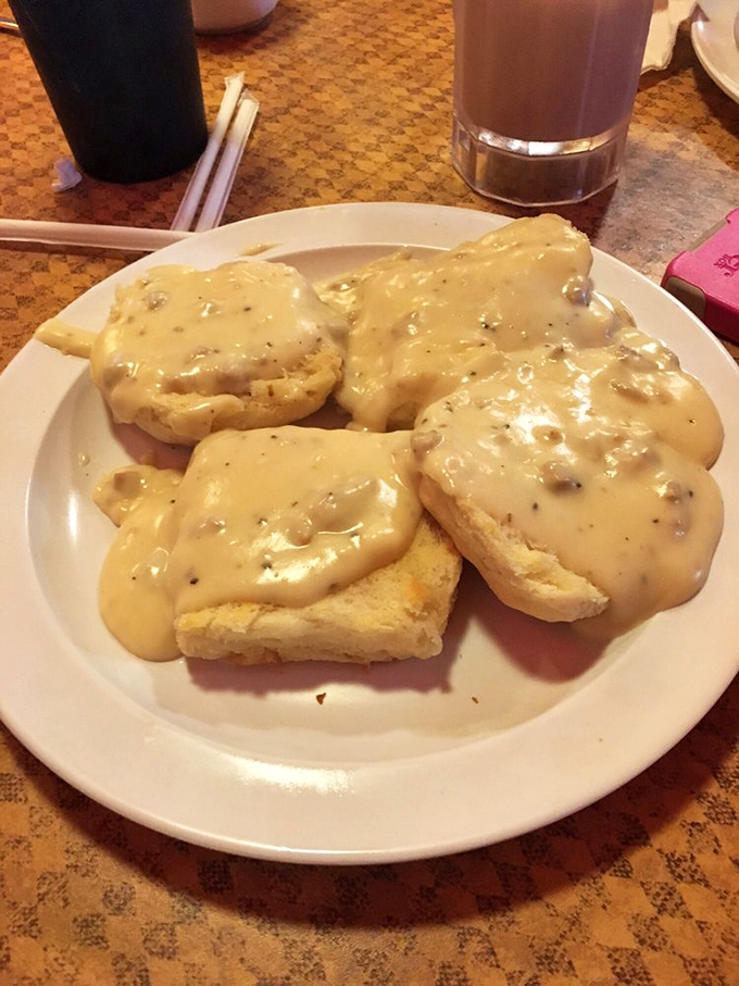 Biscuits and gravy &ndash; the breakfast that says, "Go back to bed afterward." This plate contains more comfort than a therapy session and a warm blanket combined.