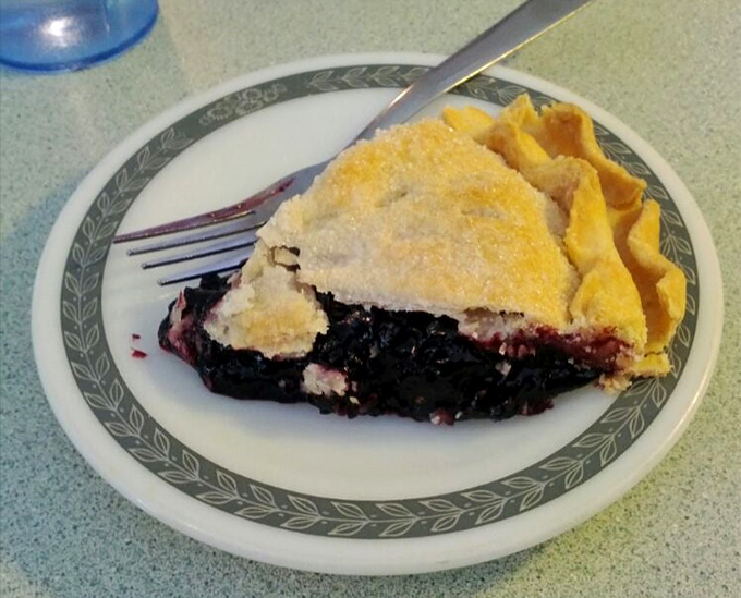 A slice of black raspberry pie that makes you understand why people used to cool pies on windowsills&mdash;and why neighbors would be tempted to steal them.