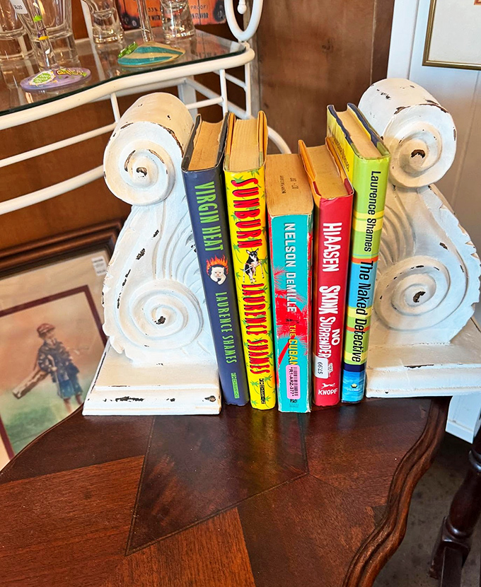 Bookends with more character than some bestselling novels. These weathered scrolls cradle colorful spines like literary guardians of forgotten stories.