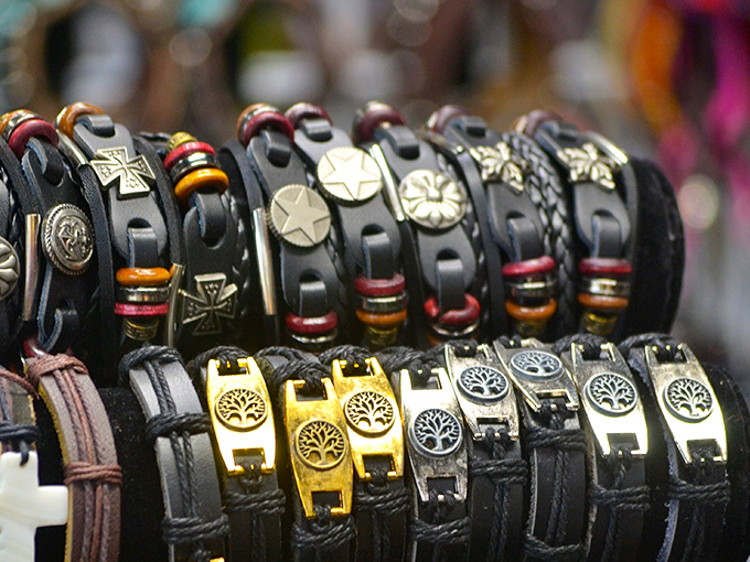 Leather bracelets with personality—wearable souvenirs that say "I'm casual but also slightly mysterious" long after your Florida tan has faded.