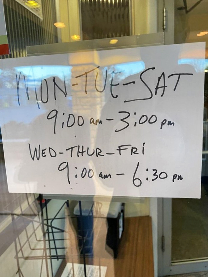 Hours posted with the charming impermanence of handwriting. In an age of digital everything, there's something reassuring about information written by human hand.