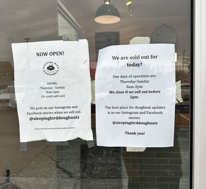 Business hours posted clearly because even paradise needs boundaries - plan your donut pilgrimage accordingly.