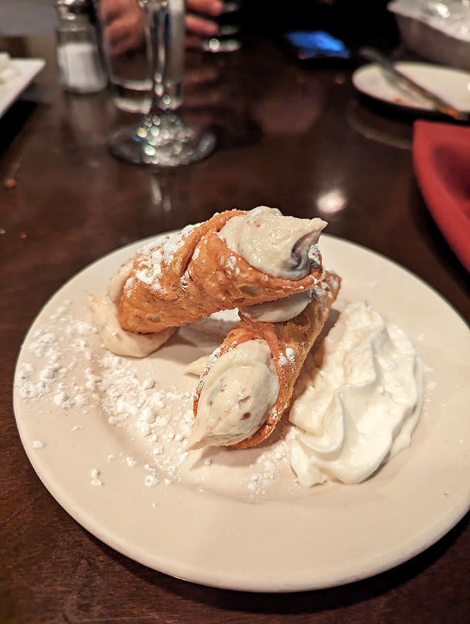Cannoli that achieve the impossible: a shell that shatters perfectly while the cream inside remains as smooth as a Sinatra ballad.