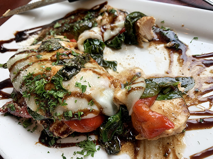 Caprese chicken that's dressed to impress&mdash;fresh mozzarella melting over grilled chicken with tomatoes and basil playing supporting roles in this culinary drama.