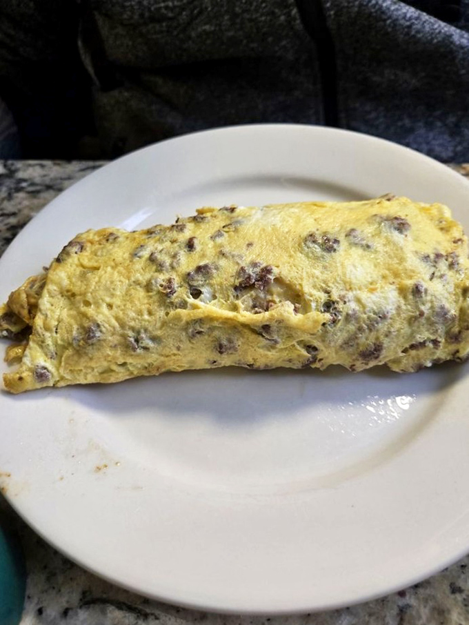 This omelet has more folds than an origami convention and enough protein to fuel a marathon. Breakfast of champions!