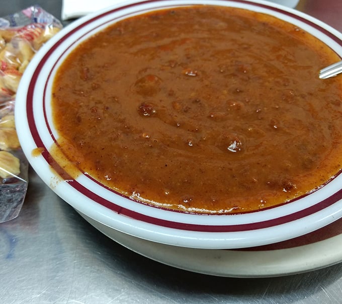 A bowl of Telway's famous chili, steaming with promise—the kind of hearty, honest food that warms both body and soul on Michigan's coldest days.
