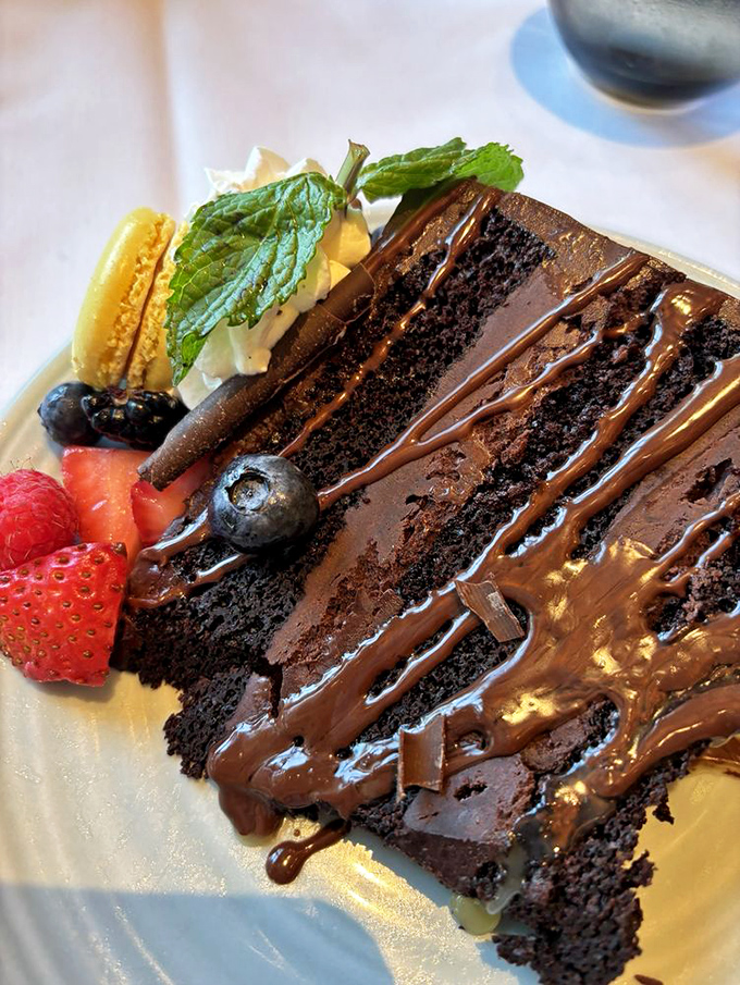 This isn't just chocolate cake &ndash; it's a multi-layered monument to decadence that makes counting calories seem like the most ridiculous concept ever invented.