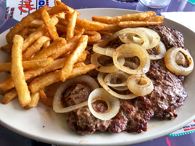 Beefsteak and onions with a golden battalion of french fries &ndash; the kind of plate that makes vegetarians question their life choices.