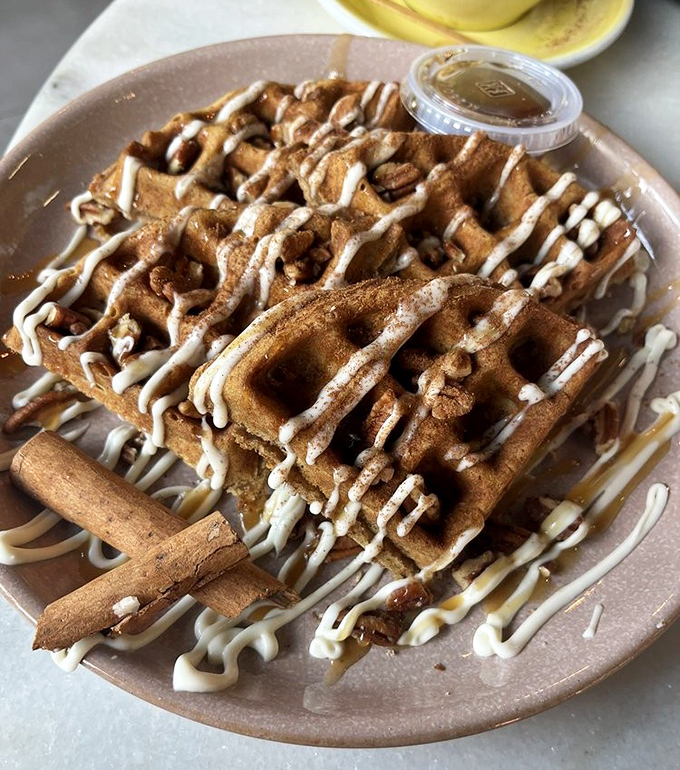 Waffles drizzled with such abandon they make Jackson Pollock look restrained. That cinnamon stick isn't just garnish &ndash; it's an exclamation point.
