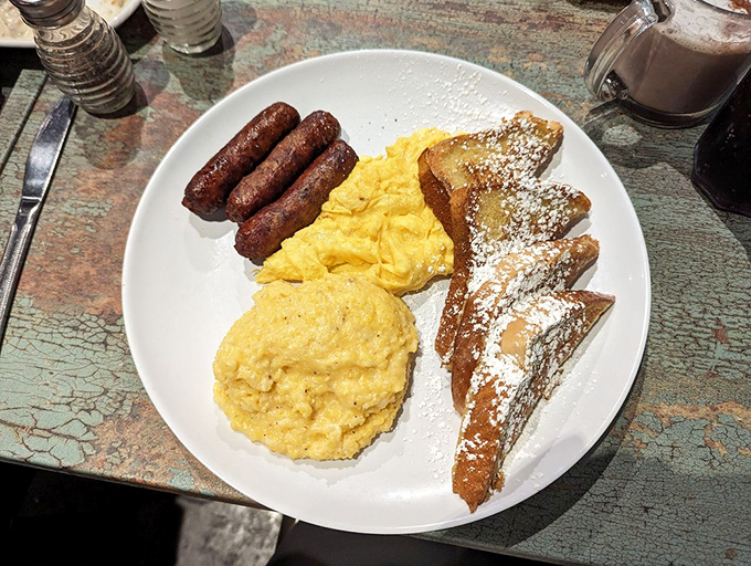 The classic breakfast plate that proves sometimes the simplest things&mdash;perfectly scrambled eggs, golden toast, and sausage&mdash;are life's greatest pleasures.