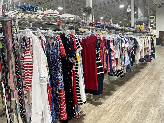 Clothing racks organized with military precision. Red, white, and blue fashion that's already been pre-loved for your convenience.