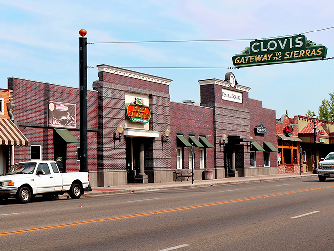 Another view of the town's signature "Gateway to the Sierras" sign, framing a streetscape where retirement dreams find their affordable California home.