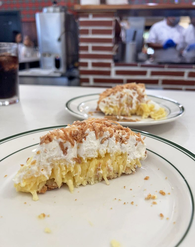 Coconut cream pie that would make your grandmother weep with joy. That toasted coconut topping is the crown jewel of dessert royalty.