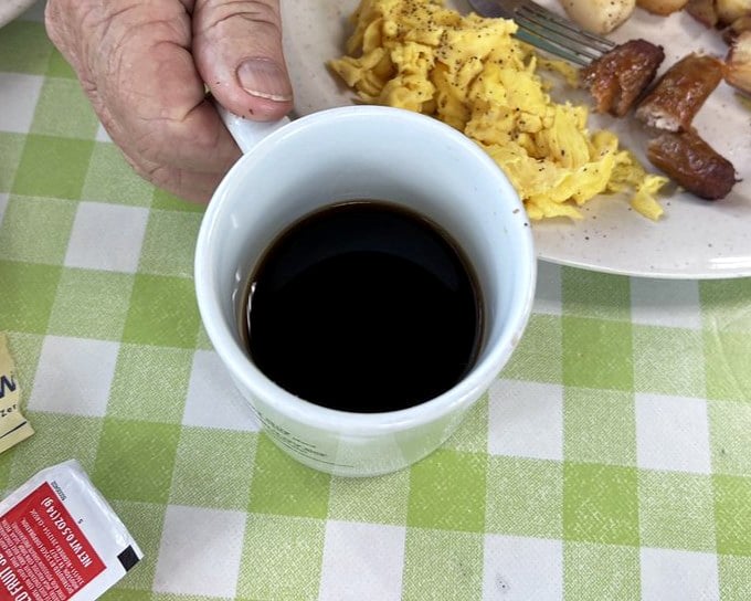 Simple black coffee in a white mug &ndash; the supporting actor that deserves an Oscar in this breakfast drama of delicious excess.