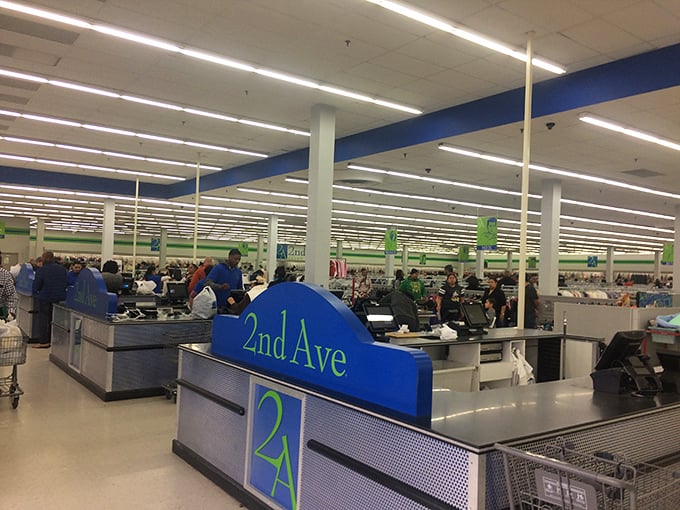 Checkout counters process treasures while shoppers calculate their incredible savings with barely contained excitement and joy.