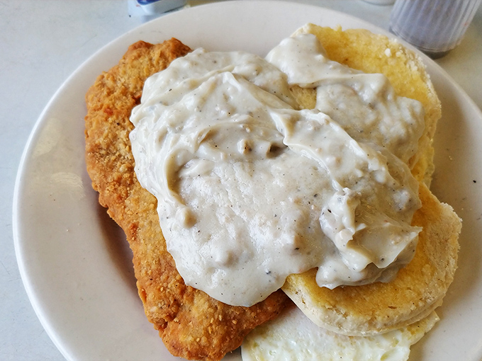 Country fried steak smothered in gravy that could make a vegetarian question their life choices, if only for a moment.