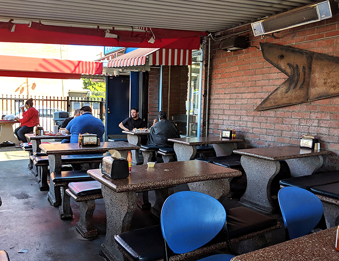 Where memories are made between bites. The covered patio provides the perfect backdrop for conversations punctuated by "you have to try this!"
