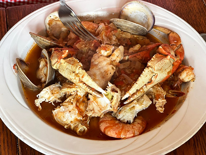 Cioppino that looks like it was made by someone's Italian grandmother&mdash;a glorious mess of shellfish and crab claws in a tomato broth worth sopping up with bread.