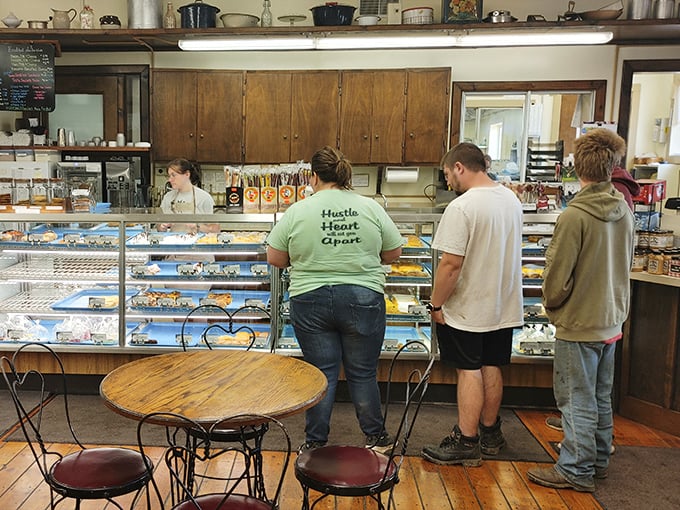 The universal language of anticipation. These customers aren't just waiting&mdash;they're about to make memories that taste like perfection.