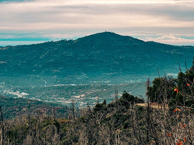 Deadwood Mountain looms majestically, providing the dramatic backdrop that makes everyday life feel cinematic.