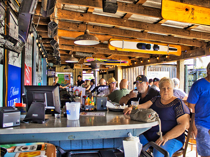 The bar at Old Man Frank's isn't just serving drinks&mdash;it's serving community, conversation, and the kind of Florida afternoon that tourist brochures can only dream about.