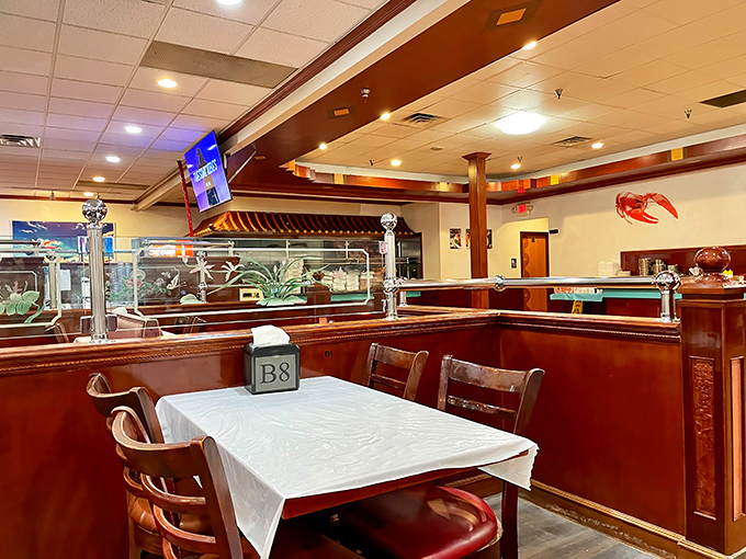 A quiet moment before the delicious storm. Each table awaits its transformation from pristine white to the beautiful aftermath of seafood satisfaction.